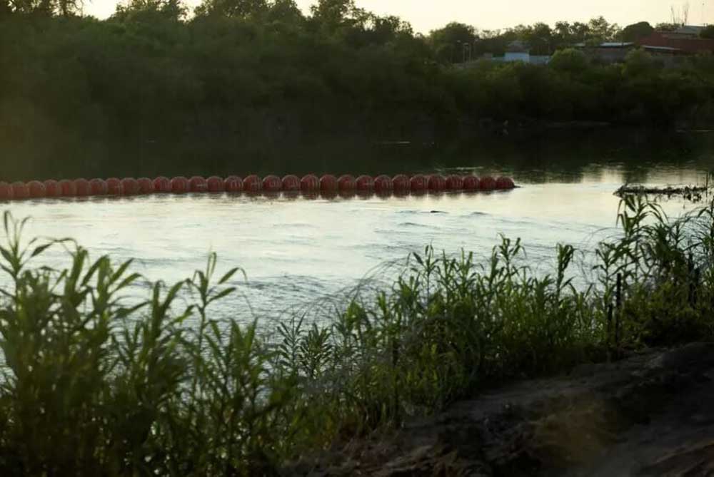 Justice Department tells Texas that floating barrier on Rio Grande ...