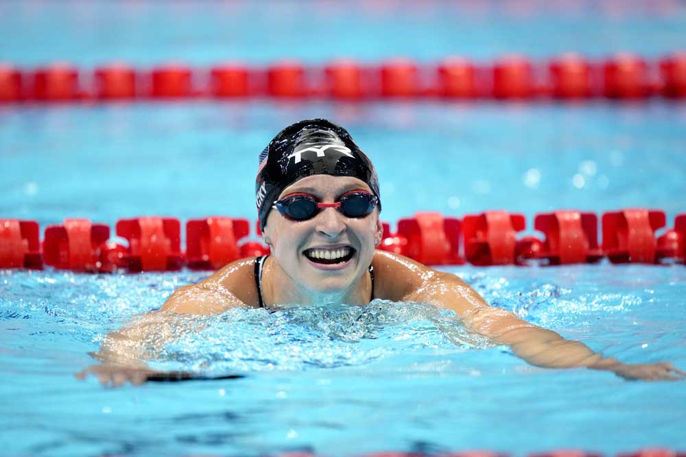 Olympics: Ledecky, Dressel star for US; Thompson-Herah wins 100 meters ...